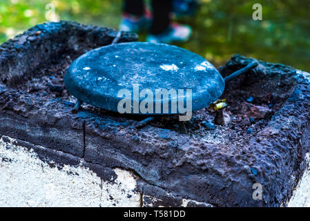 vintage stone tilesfor cooking in nature at the stake Stock Photo - Alamy