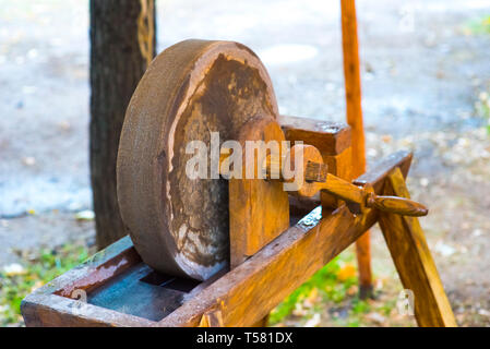 old rotary grindstone at a country house Stock Photo - Alamy