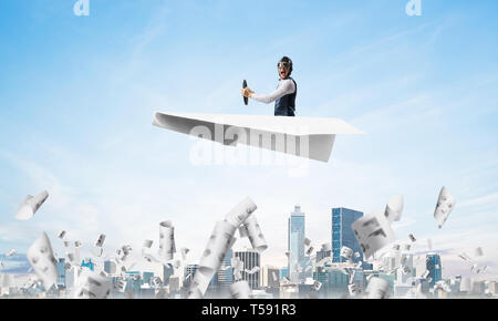 Screaming pilot sitting in paper plane Stock Photo - Alamy