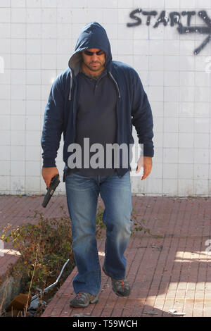 This image shows a person with a weapon attacking someone or something ...