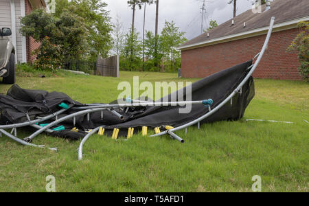 Trampoline mangled and damaged from wind during storm and severe ...