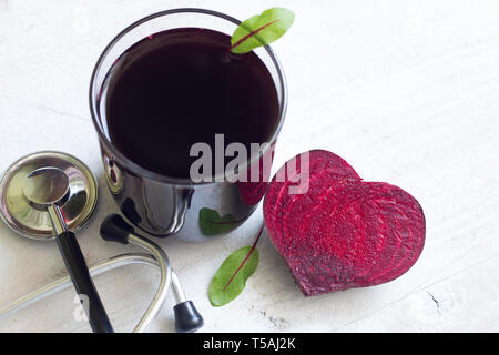 Healthy beetroot with heart shape and juice Stock Photo - Alamy