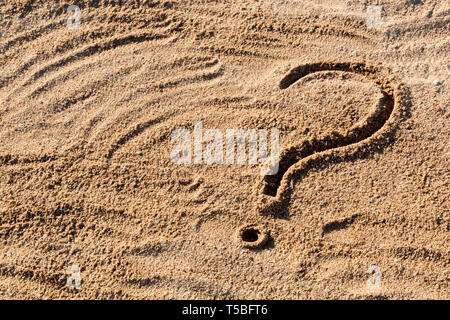question marks written on beach sand close up, with copy space Stock ...