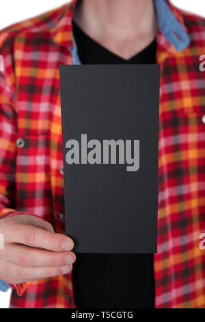 Man holding flyer on blue background, closeup. Mockup for design Stock ...