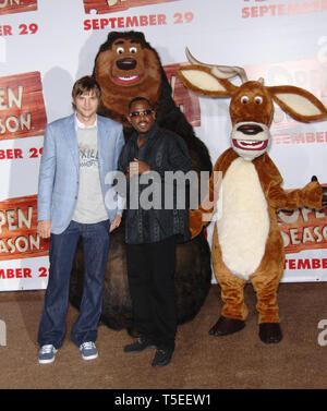 Actors Ashton Kutcher, left, and Martin Lawrence pose for photographers ...