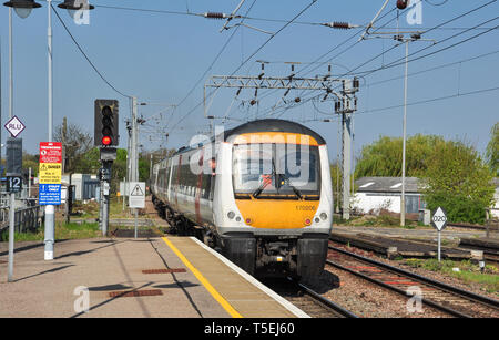 Greater Anglia Class 170 DMU waits in platform 1 with a northbound ...