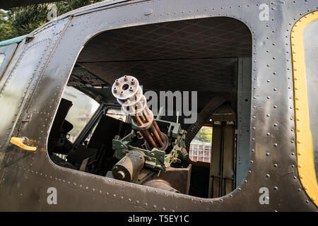 The M134 Minigun mounted inside a Huey helicopter at the War Remnants ...