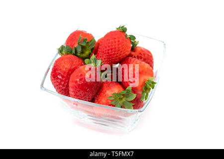 Glass bowl filled with over ripe strawberries Stock Photo - Alamy