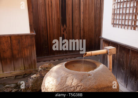 Traditional stone Japanese water feature, Gioji temple gardens, Kyoto ...