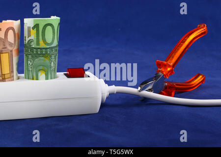 Separation of the power supply. Cutting through a power cable with the ...