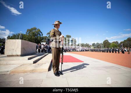Canberra, Australia. 25th Apr, 2019. People take part in a one-minute ...