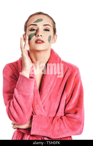 Spa Woman applying Facial green clay Mask. Beauty Treatments. Close-up ...