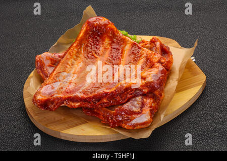 Raw marinated pork ribs ready for cooking Stock Photo - Alamy