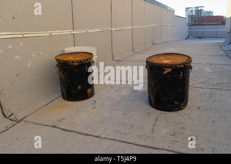 Metal and plastic used buckets isolated set Stock Photo - Alamy
