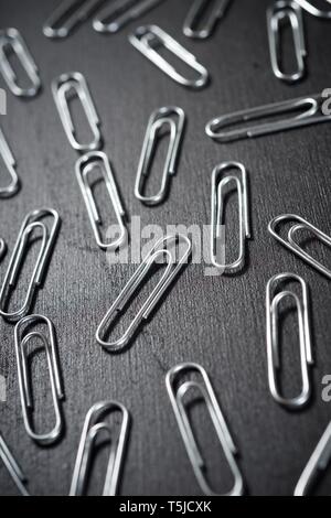 Paper clips on the table Stock Photo - Alamy