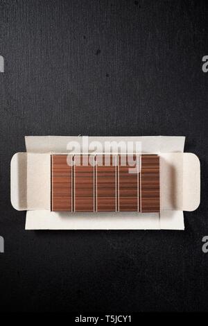 Stapler and staples with paper lay on wood table Stock Photo - Alamy