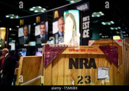 A wooden crate is marked NRA at the NRA convention. Vendors prepare ...