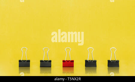 Office supplies background - paper binder clips top view Stock Photo ...