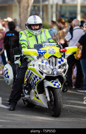 A New Zealand police officer in riot gear (helmet, body armor and ...
