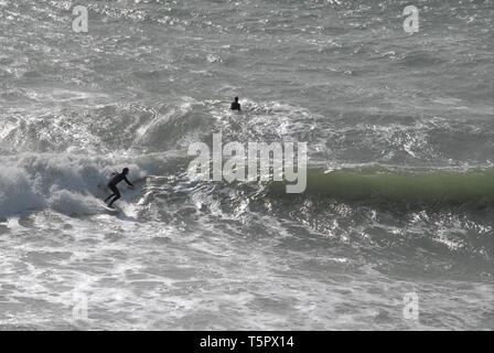 Chesil beach. 26th April 2019. Surfers enjoy the waves on Chesil Beach ...