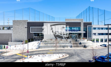 A drone / aerial view of TopGolf. Topgolf features three floors of ...