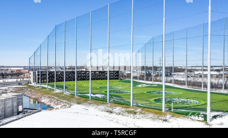 A drone / aerial view of TopGolf. Topgolf features three floors of ...