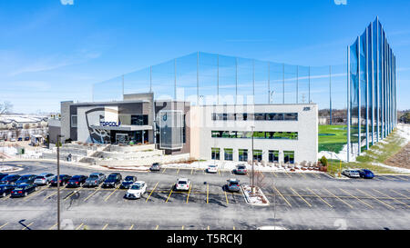 A drone / aerial view of TopGolf. Topgolf features three floors of ...