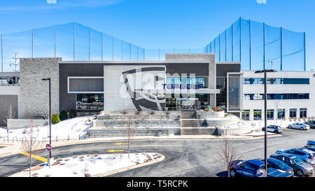 A drone / aerial view of TopGolf. Topgolf features three floors of ...
