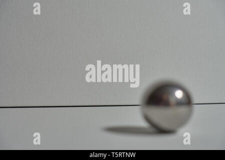 Isolate pinball bearing on white surface Stock Photo - Alamy