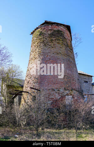 A wide angle shot from the base of an abandoned windmill Stock Photo ...