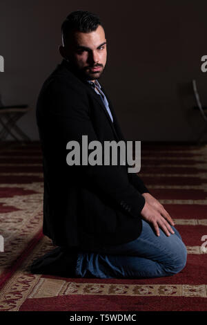 Attractive Man Making Traditional Prayer to God Allah in the Mosque ...