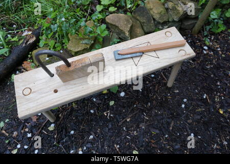 roman hand saw on a carpenters bench with herculaneum holdfast ...