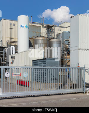 Hedingen, Switzerland - April 19, 2019: a green field in the foreground ...