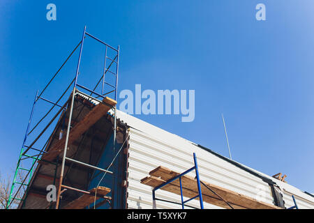 Scaffold between floors and interior partitions in construction ...