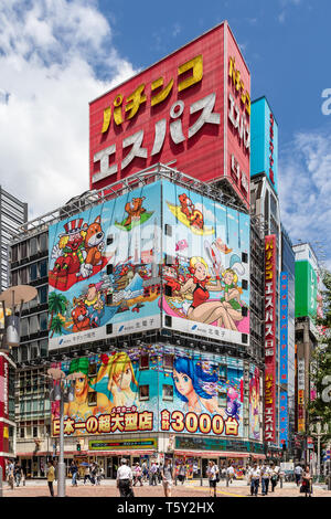 Anime-style billboards and Pachinko E-Space Nittaku sign on building ...
