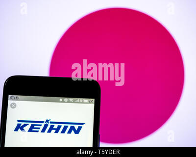 In this photo illustration a Keihin Corporation logo seen displayed on ...