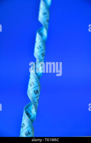 soft tailor meter ruler in metric units on a wooden desk Stock Photo ...