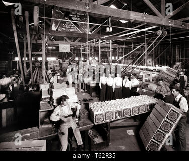 Group of male and female factory labor join hands together after finish ...