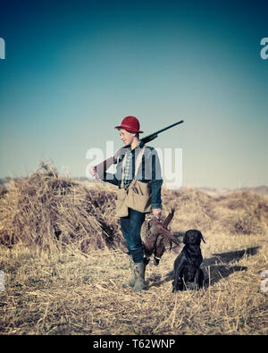 Teenage boy hunting with shotgun in Petersburg State Game Area ...