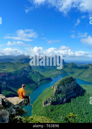 Tourist at the viewpoint, view of the Blyde River gorge, Lowveld ...