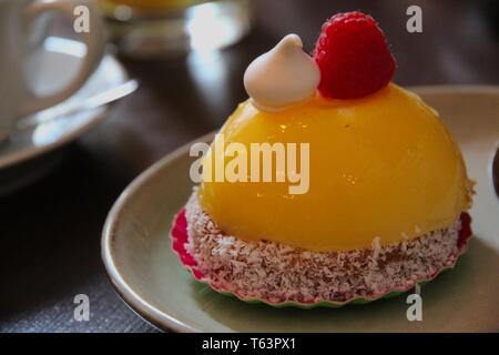 Delicious Dessert With Meringue Topping and Coffee on a Wooden Table ...