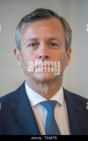 Schwerin, Germany. 29th Apr, 2019. The defendant is taken to the ...