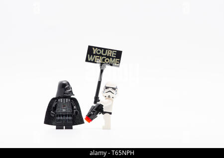 lego storm trooper holding you are welcome sign. Lego minifigures are ...