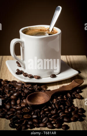 pile of fresh beans, cap, and spoon on dark background Stock Photo - Alamy