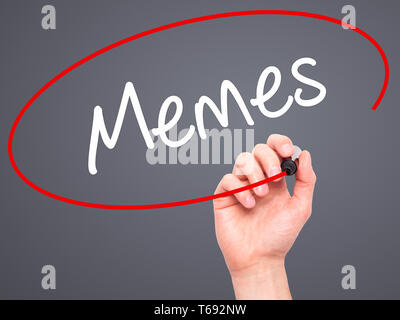 Man Hand writing Memes with black marker on visual screen. Isolated on ...