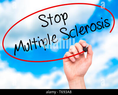 Man Hand writing Multiple Sclerosis with black marker on visual screen ...