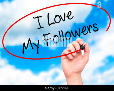 Man Hand writing I Love My Followers with black marker on visual screen ...