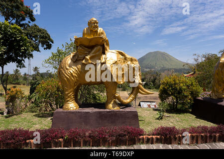 fat monk on elephant statue in complex Pagoda Ekayana, Nort Sulawesi ...