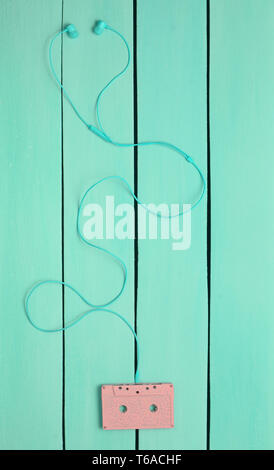 Love for music headphones on a colored background. Top view Stock Photo ...