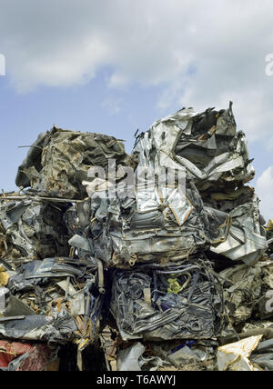 Flattened cars at junkyard Stock Photo - Alamy